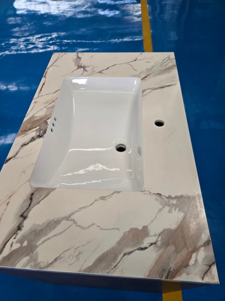 Luxury White Sintered Stone countertop featuring a seamless basin ...